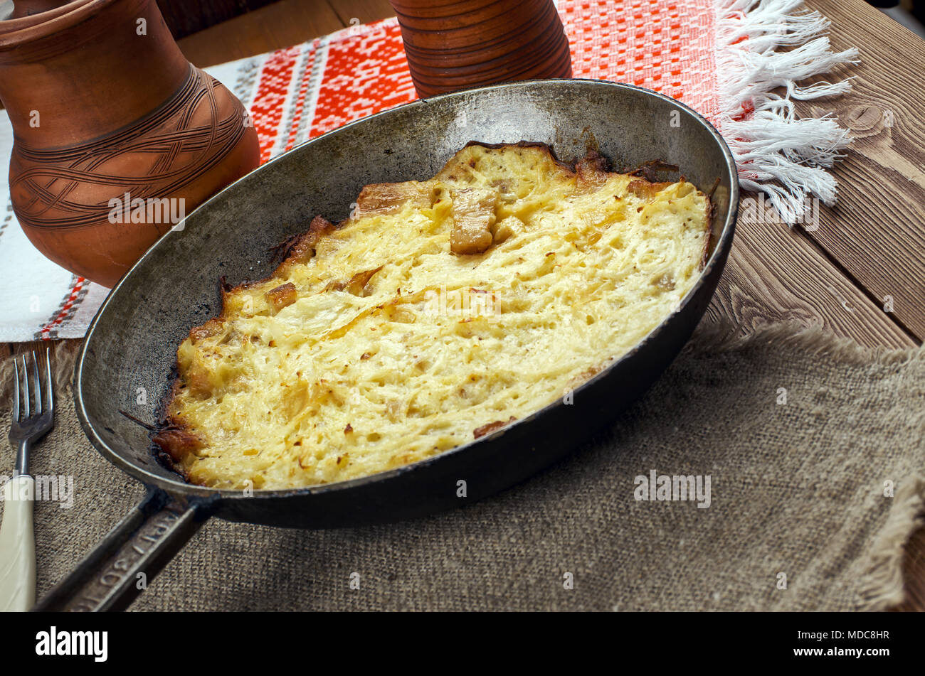 Potato babka - made from grated potatoes, eggs, onions, and pieces of ...