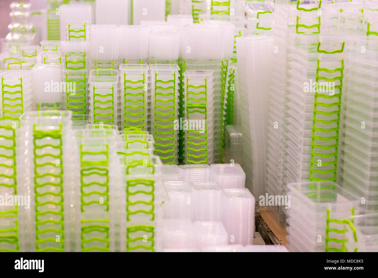 Plastic box container on shelf in the store Stock Photo - Alamy