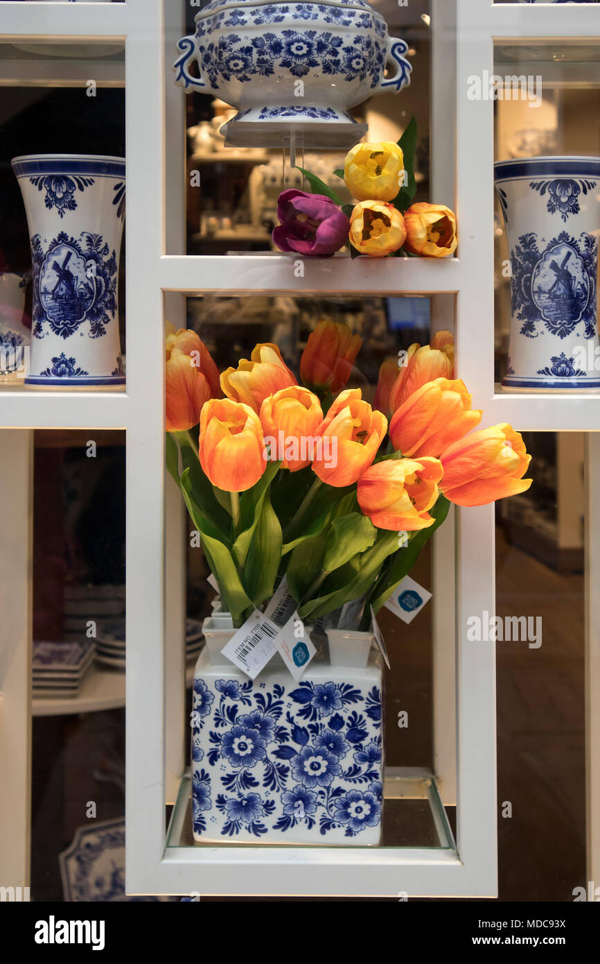 Amsterdam, Holland - 14 April 20018 Showcases of Dutch shops with blue ...