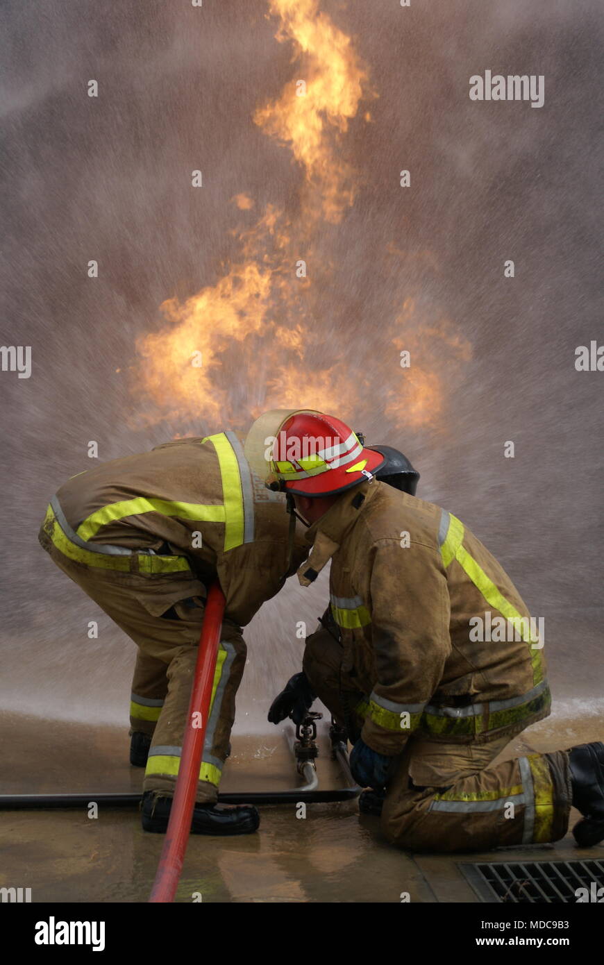 Chemical tank fire fighters hi-res stock photography and images - Alamy