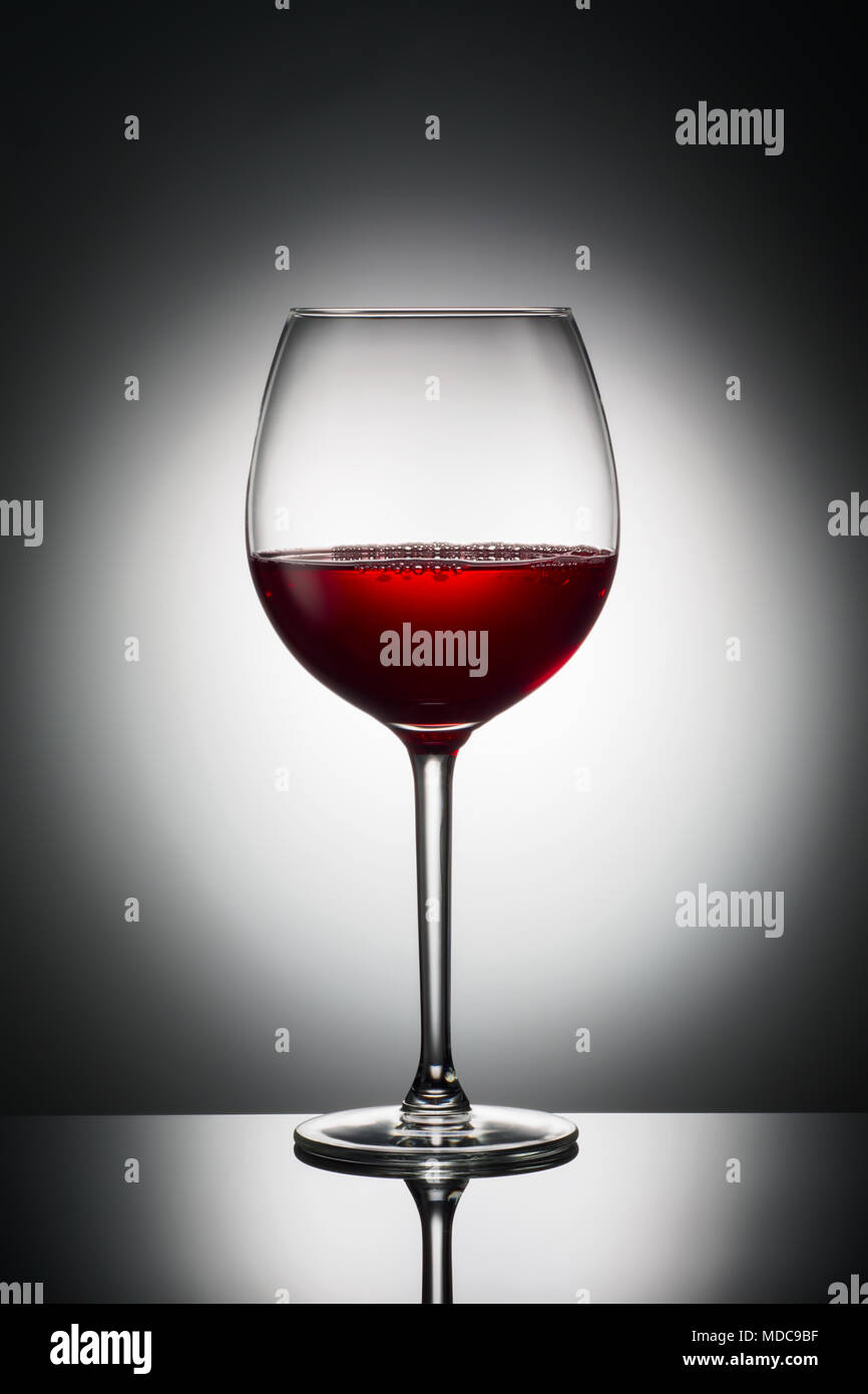 Large glass red wine shape of dark from grapes alcoholic beverage on ...