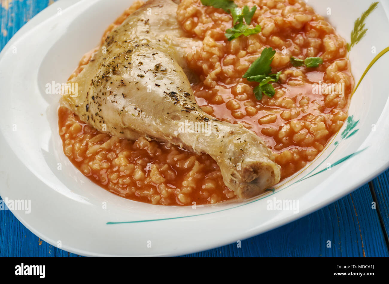Dominican Locrio De Pollo - Dominican Style Chicken And Rice Stock ...