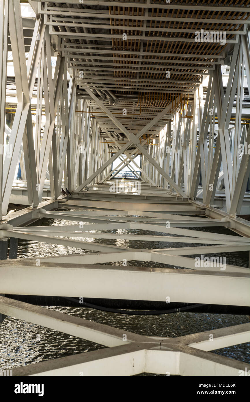 Industrial metal structure over water forming like a giant web Stock ...