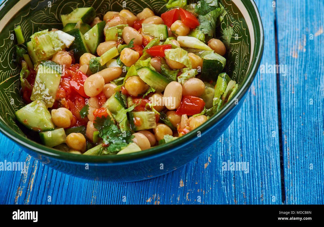 Balela - Middle Eastern-style bean salad, made with garbanzo and black ...