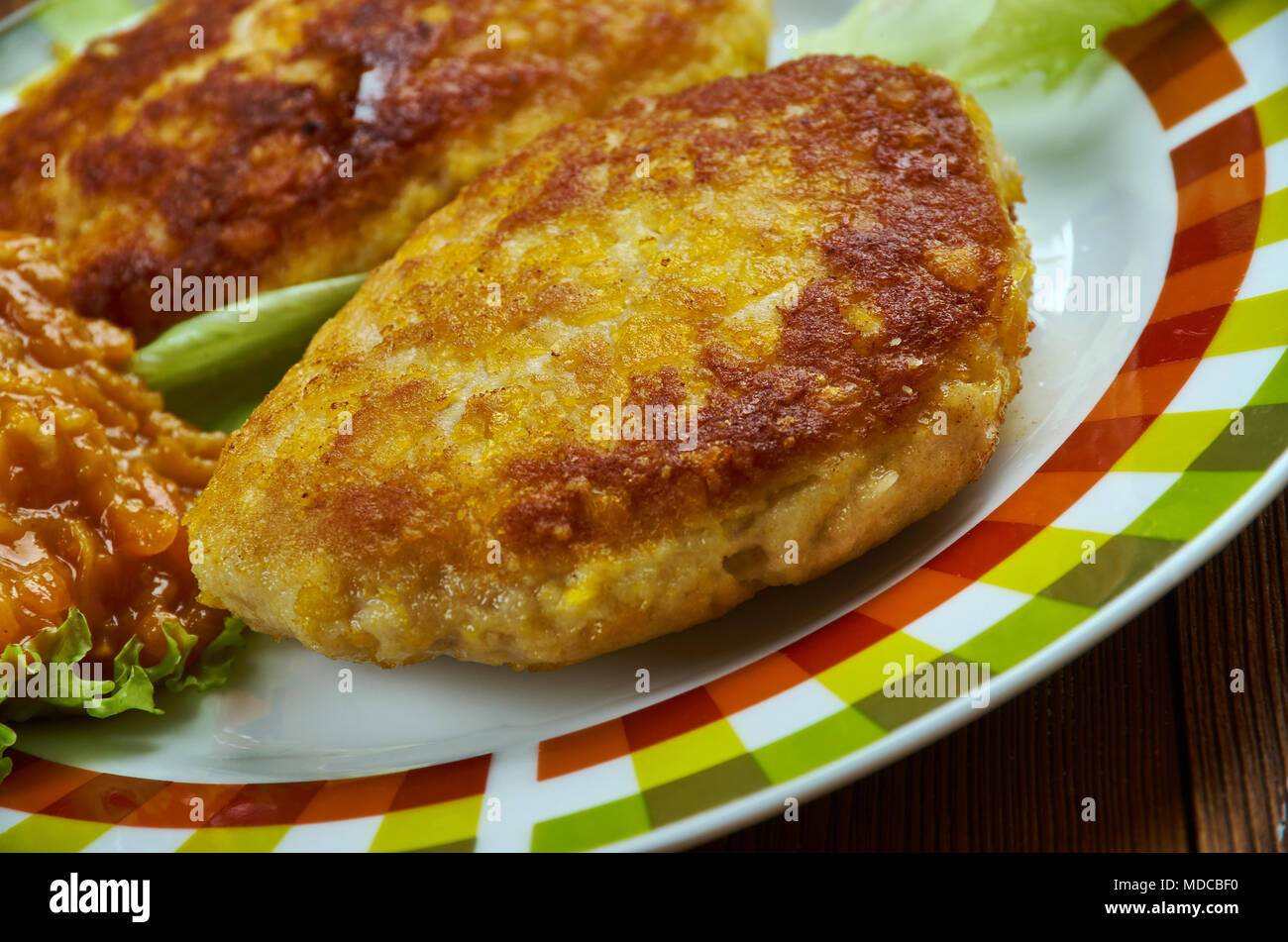 Chuleta valluna - Colombian Breaded Pork Cutlets Stock Photo - Alamy