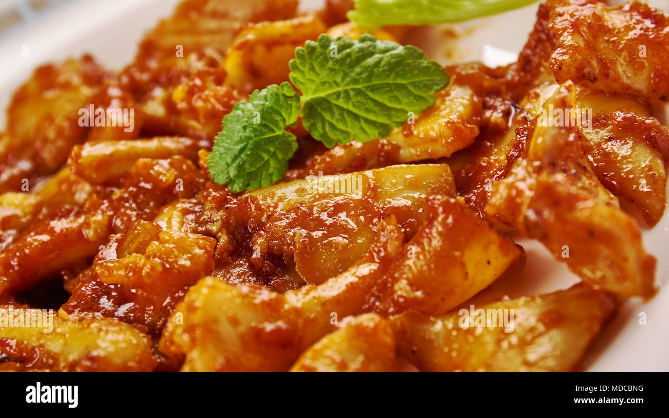 Indian cuisine . koonthal - Squid Kerala Roast ,Traditional assorted ...