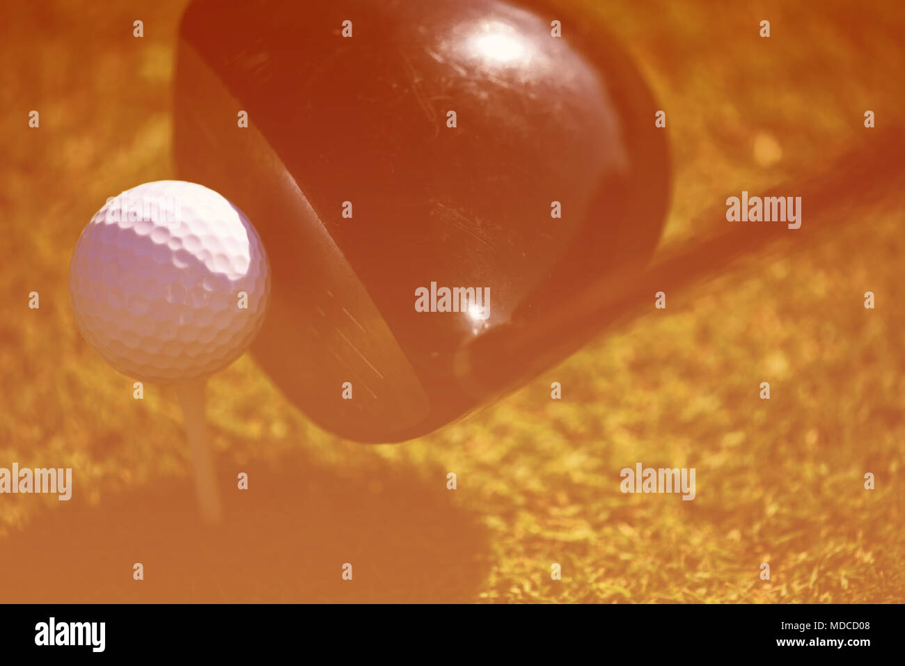 top view of golf club and ball in grass on course preparing for shot ...
