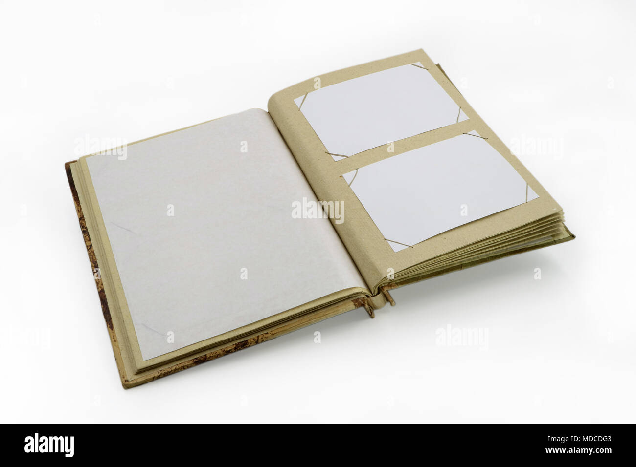 open diary or photo album book on white background Stock Photo - Alamy