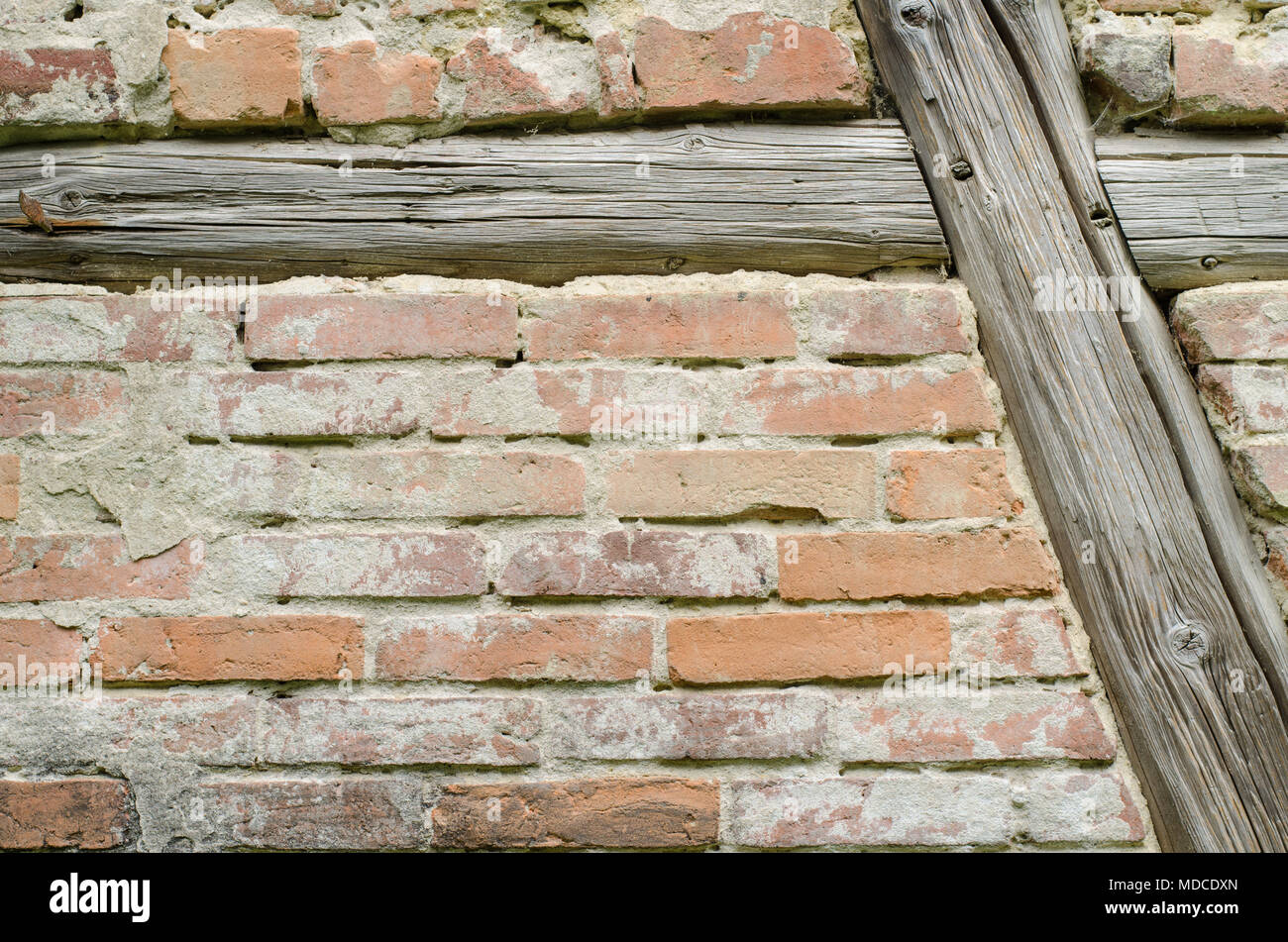 background of an old brick wall with decaying timber framing Stock ...