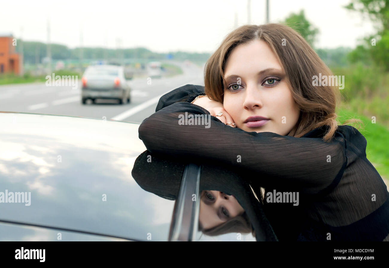Leaning against convertible car hi-res stock photography and images - Alamy