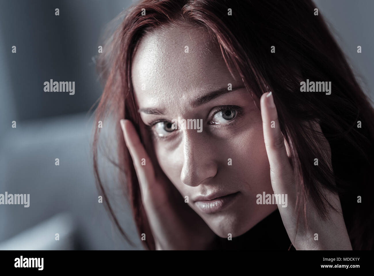 Upset beautiful woman feeling grief Stock Photo - Alamy