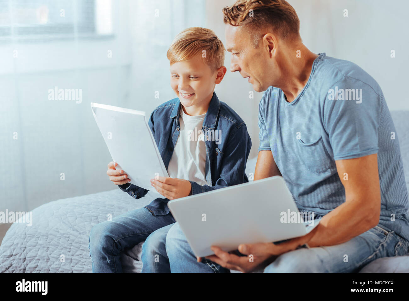 Parent supporting child hi-res stock photography and images - Alamy