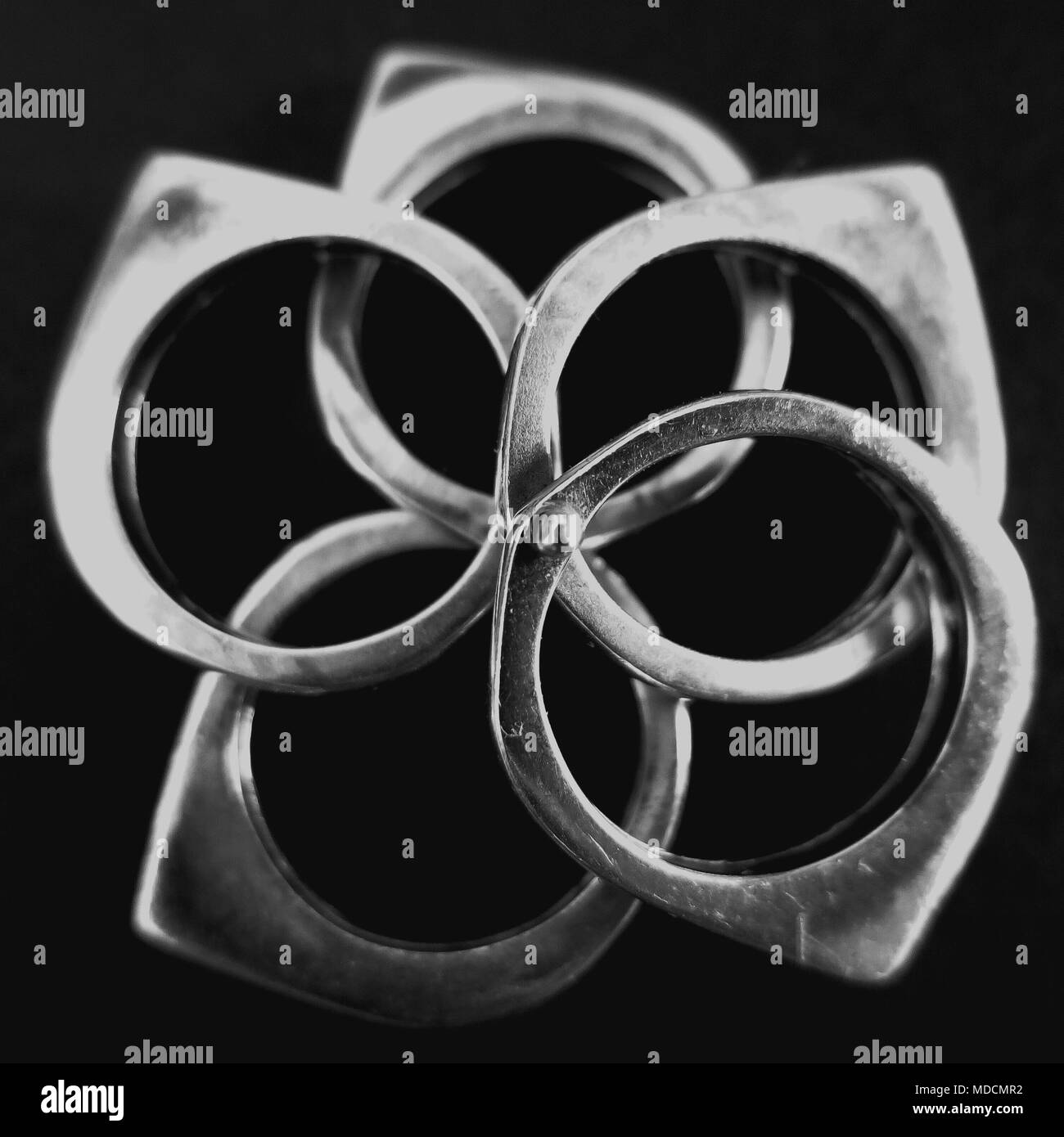 Silver rings against dark hi-res stock photography and images - Alamy