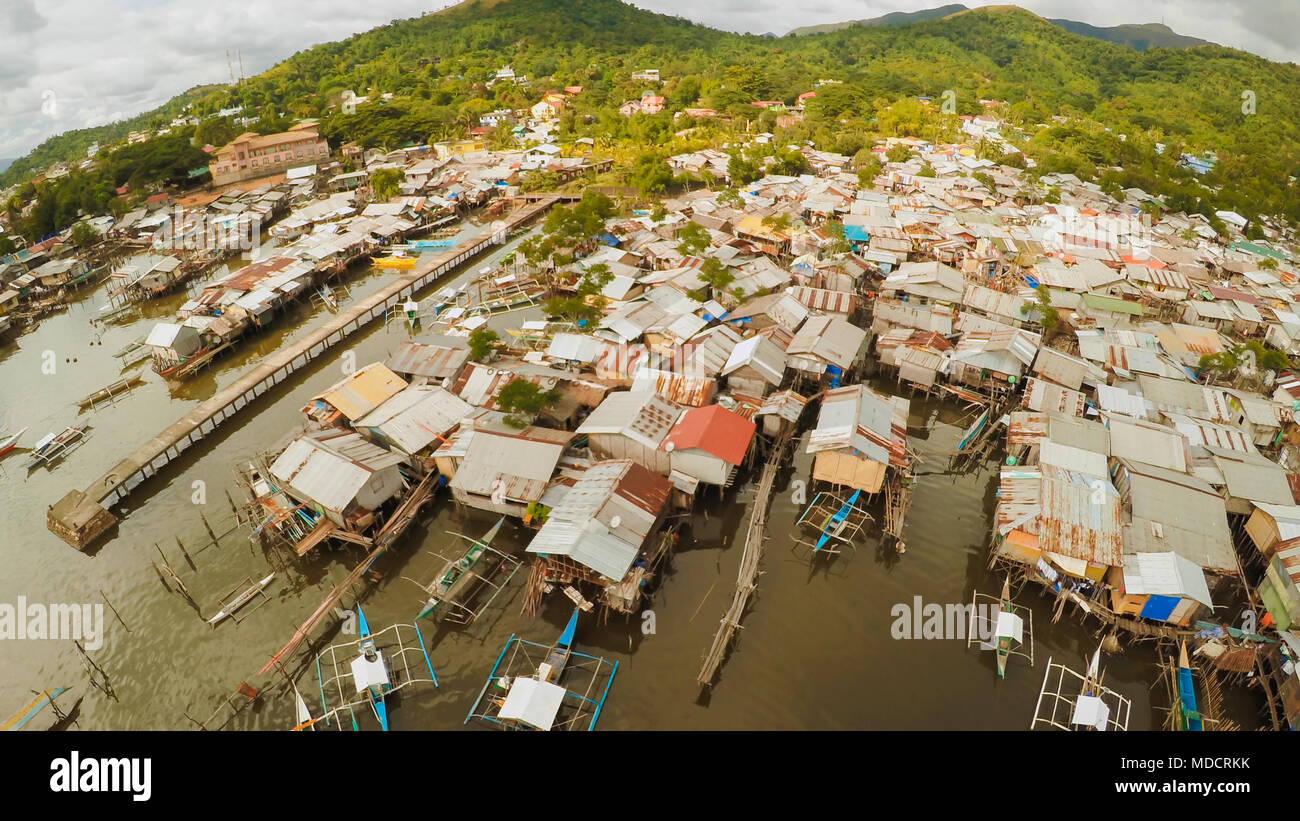 Philippine slums on the beach. Poor area of the city. Coron. Palawan ...