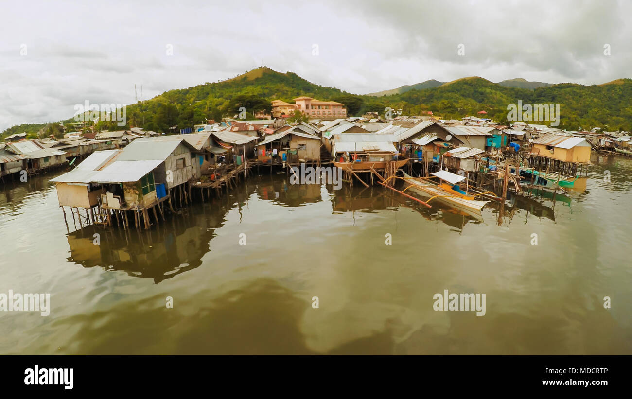 Philippine slums on the beach. Poor area of the city. Coron. Palawan ...