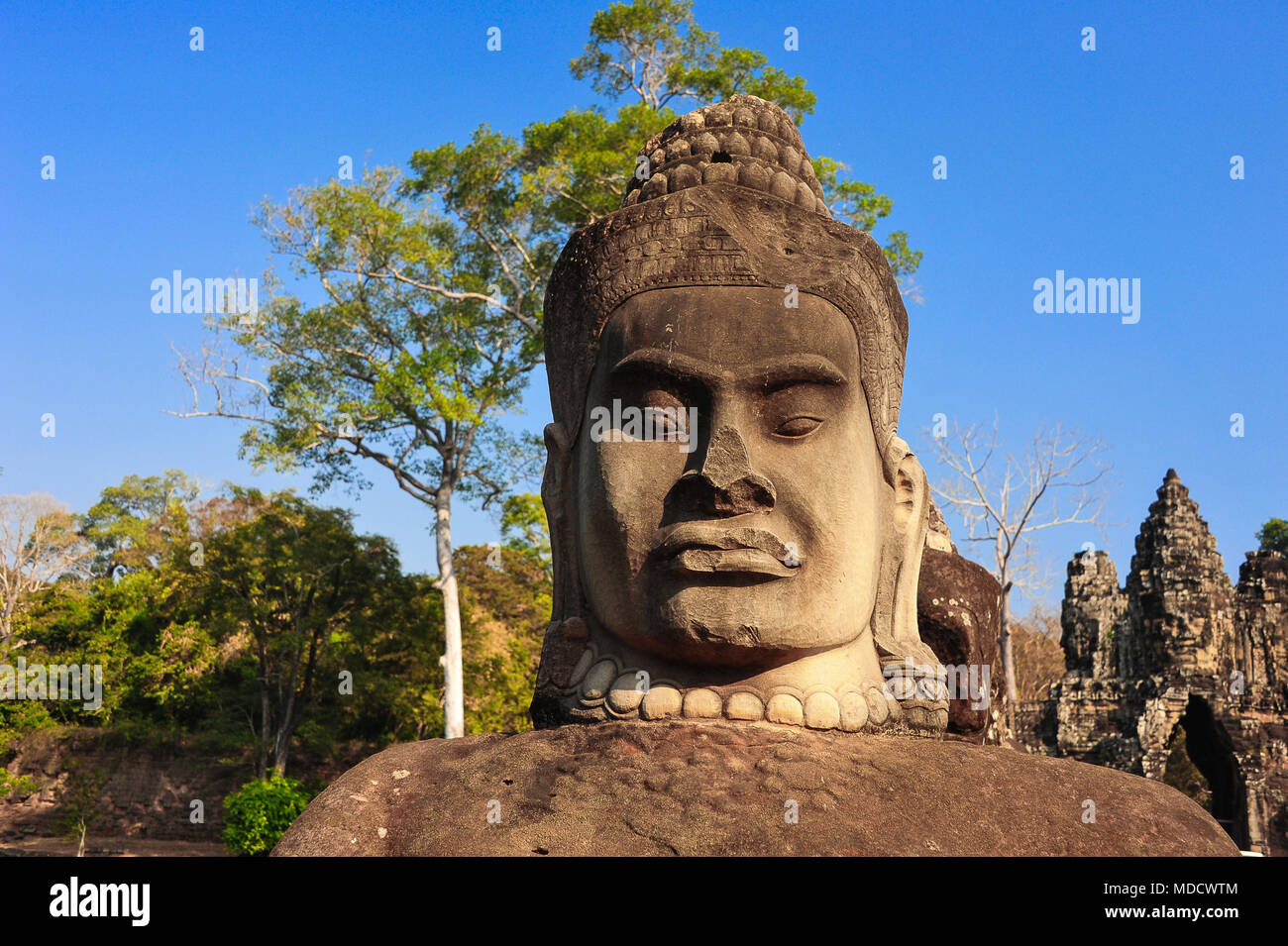 One of the temple guardians at the main gate to 12th-century, Bayon ...