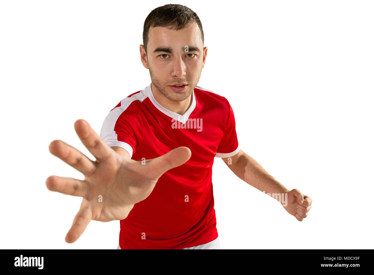 aggressive and menacing soccer or football player Stock Photo - Alamy