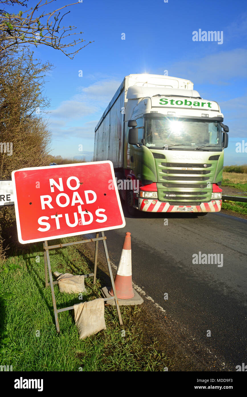 lorry passing warning sign of no road studs/cats eyes in road ahead ...