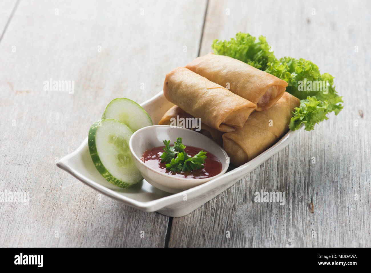 deep fried spring rolls , popia Stock Photo - Alamy