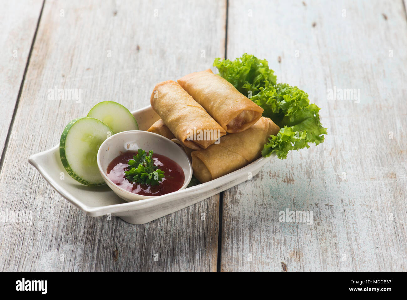 deep fried spring rolls , popia Stock Photo - Alamy