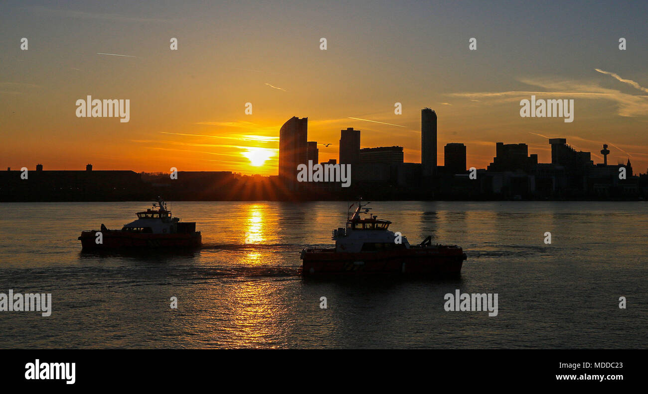 The sun rises behind the Liverpool skyline on what is expected to be ...