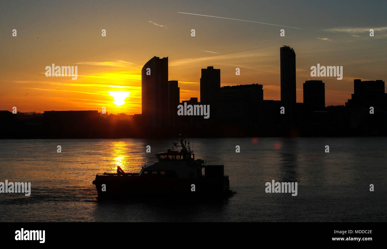 The sun rises behind the Liverpool skyline on what is expected to be ...