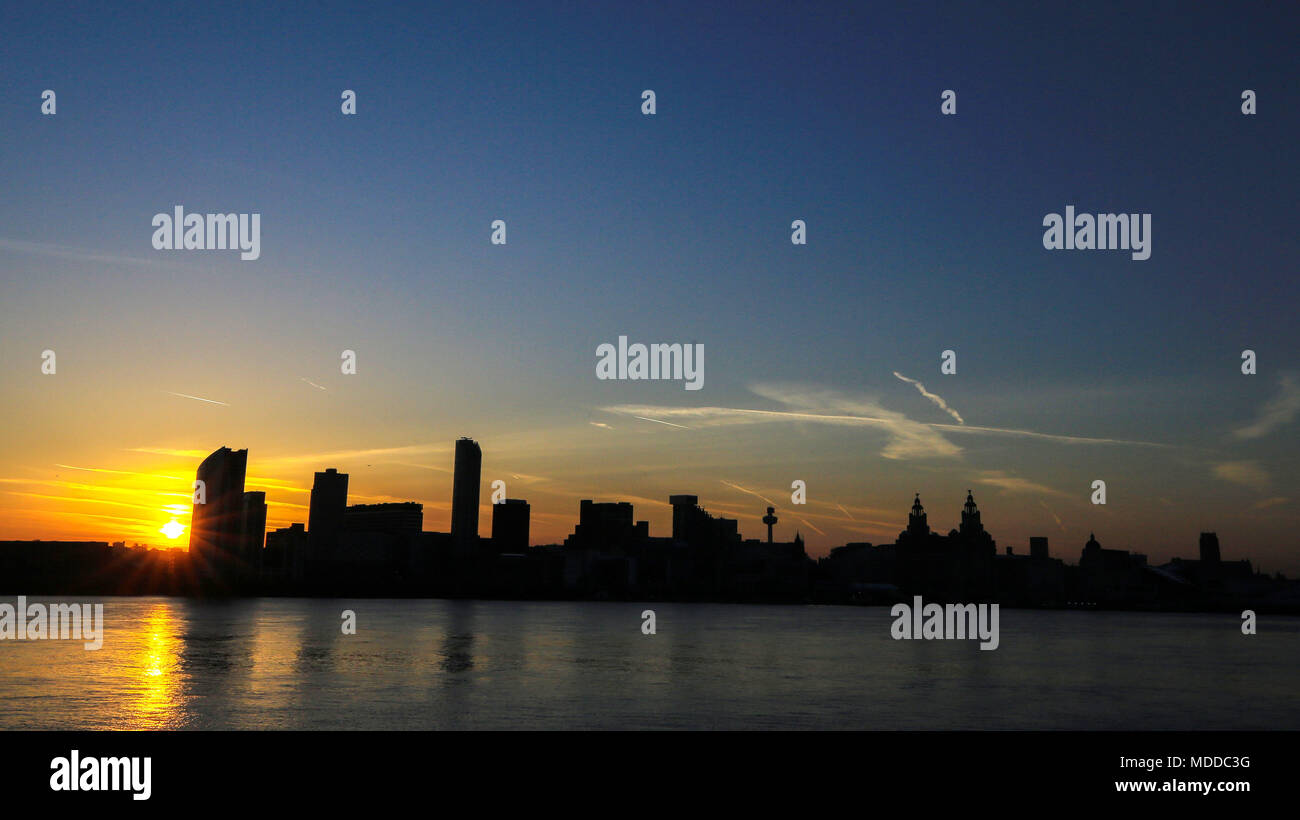 The sun rises behind the Liverpool skyline on what is expected to be ...