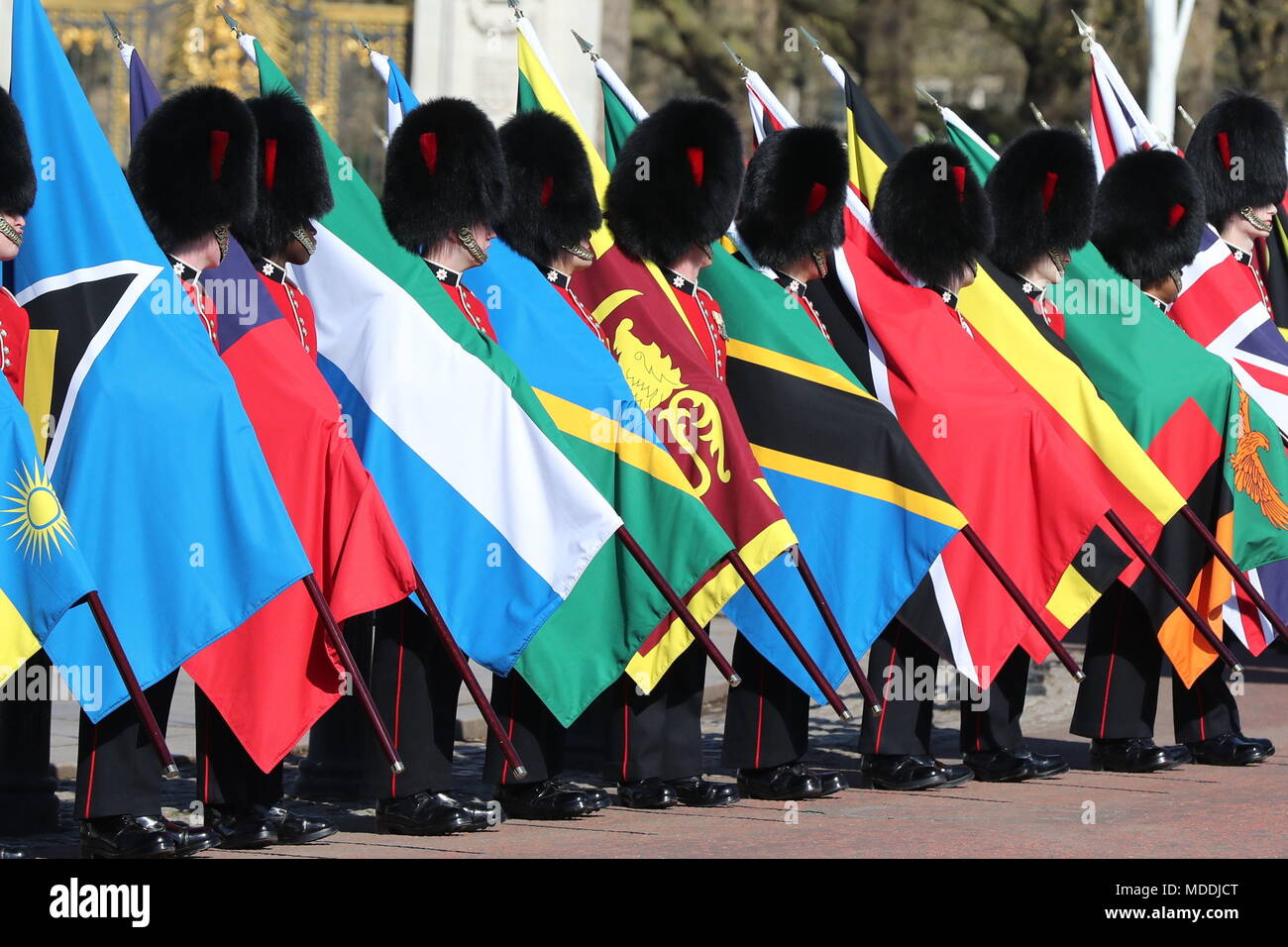 Soldiers of the Coldstream Guards carry flags of the 53 Commonwealth ...