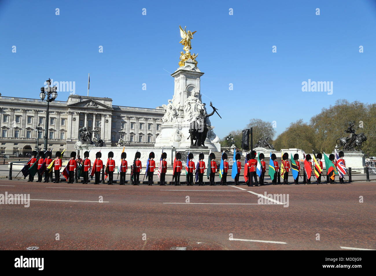 Soldiers of the Coldstream Guards carry flags of the 53 Commonwealth ...