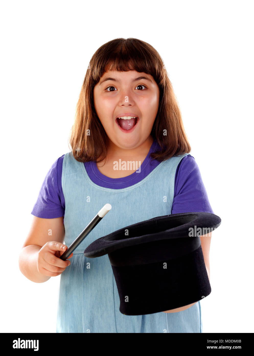 Pretty little girl doing magic with a top hat and a magic wand isolated ...