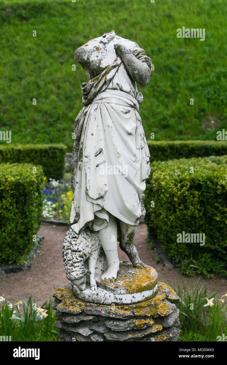 Zolchiv, Ukraine - May 2 2017: Old ruined statue of women without head ...