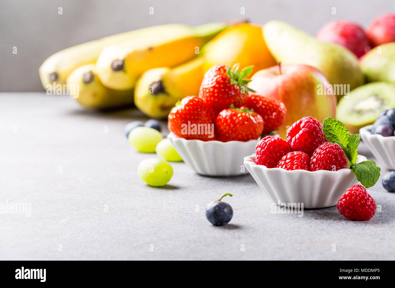 Fresh assorted fruits and berries Stock Photo - Alamy
