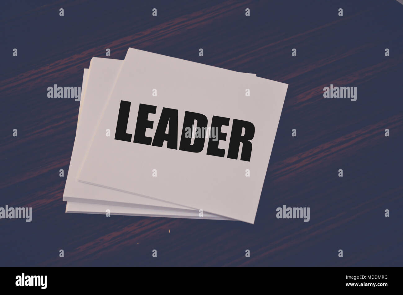 Leader word written on white paper, business concept background Stock ...