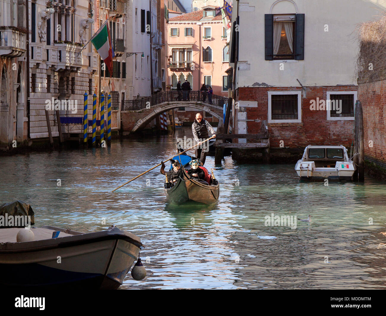 View on Venetian canal with gondola, Italy Stock Photo - Alamy
