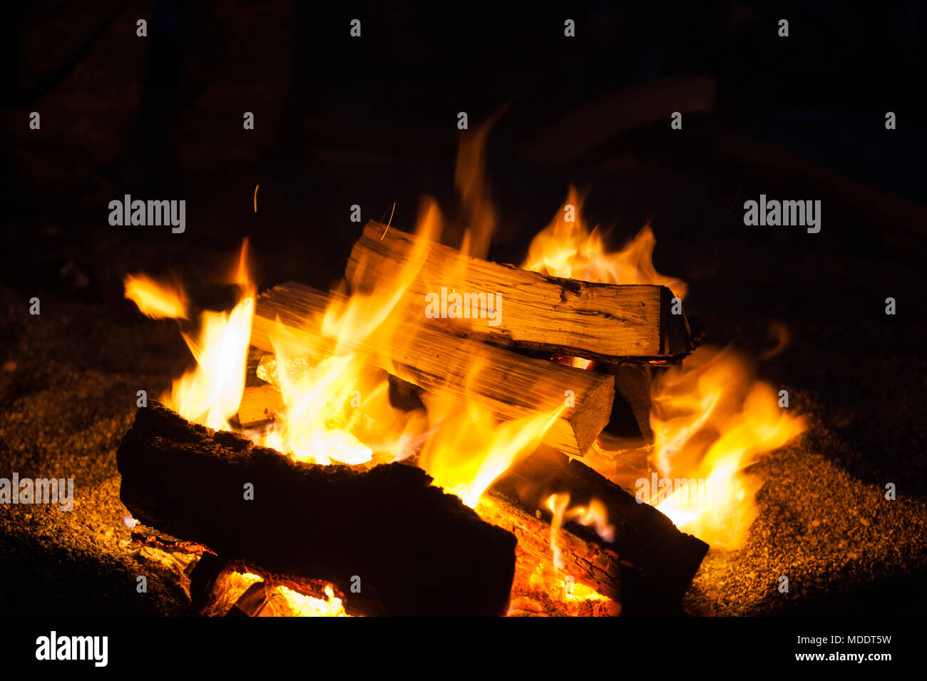 Beautiful burning bonfire in night close up Stock Photo - Alamy