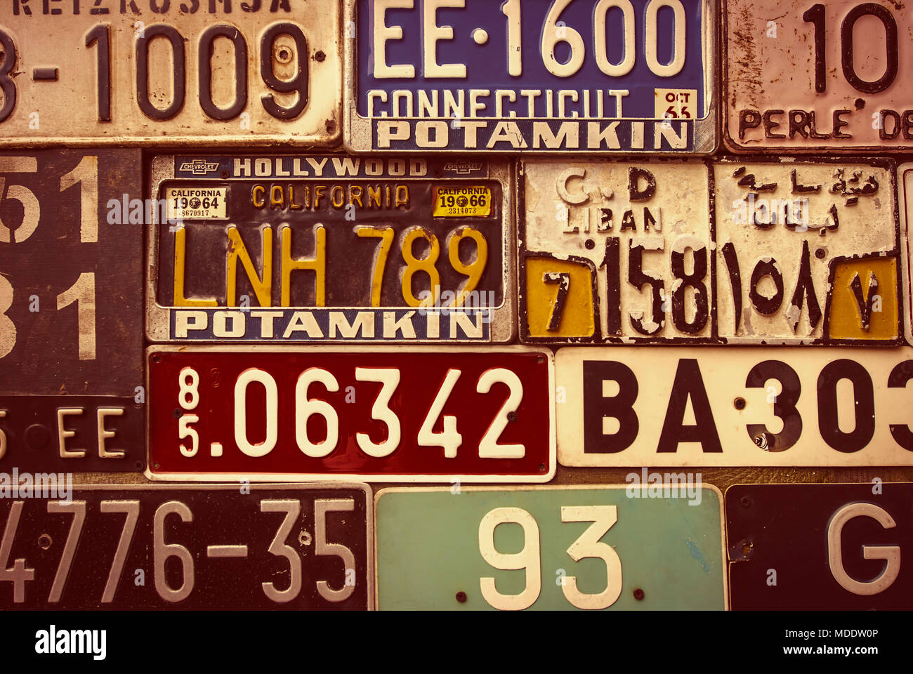 Various retro License Plates on the wall Stock Photo - Alamy