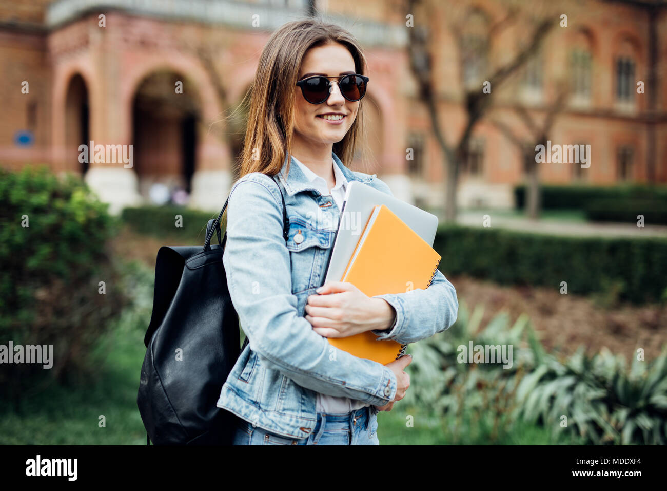 smart young female college student on campus Stock Photo - Alamy