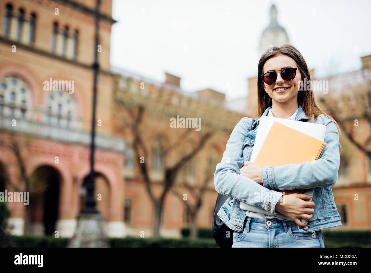 smart young female college student on campus Stock Photo - Alamy