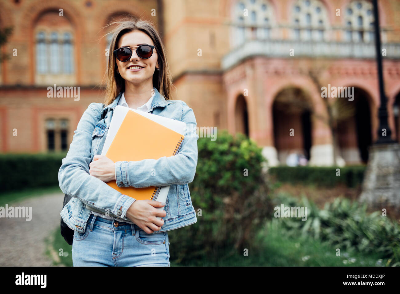 smart young female college student on campus Stock Photo - Alamy