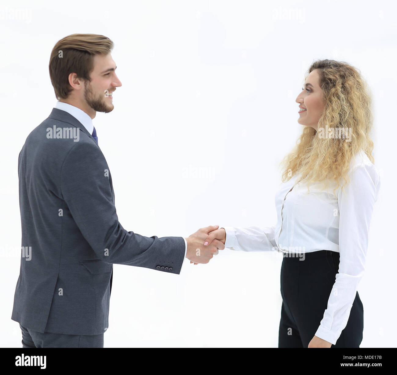 handshake Manager and client on blurred background Stock Photo - Alamy