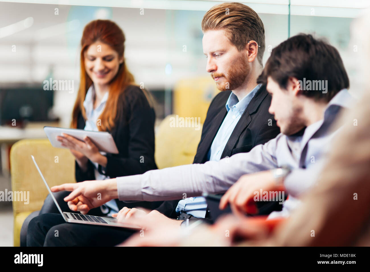 Business people conversation. Technology at hand Stock Photo - Alamy