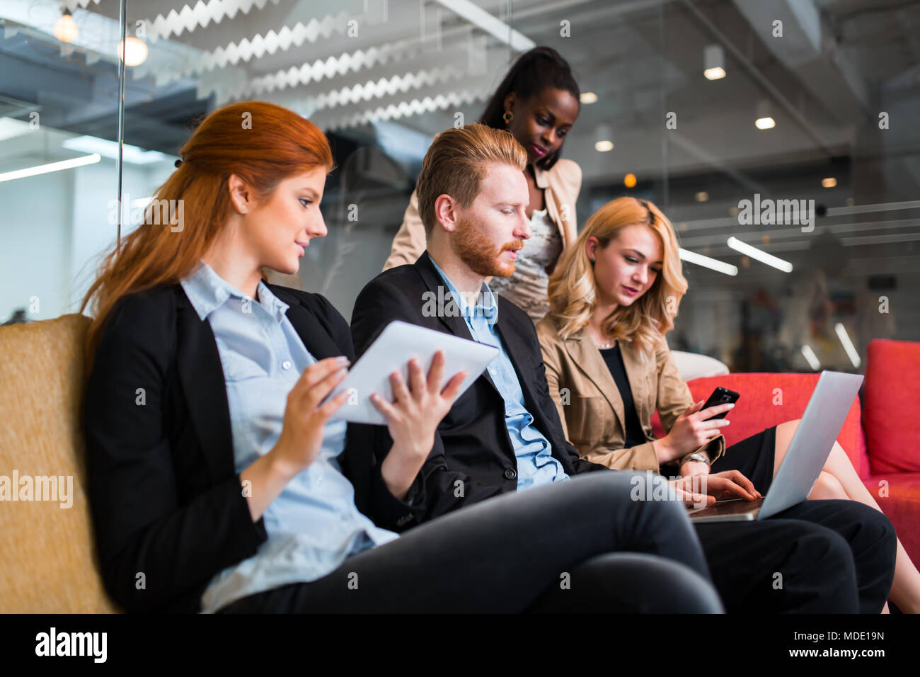 Business people conversation. Technology at hand Stock Photo - Alamy