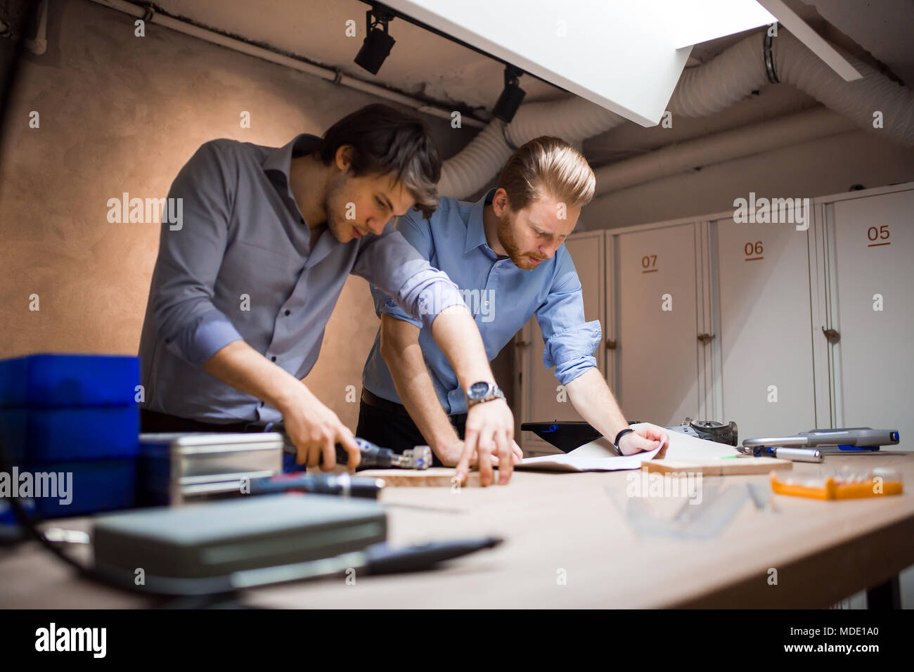 Two designers working together Stock Photo - Alamy