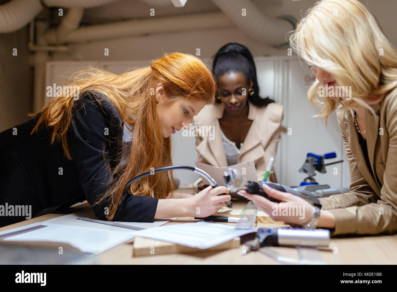 Creative women working on project Stock Photo - Alamy