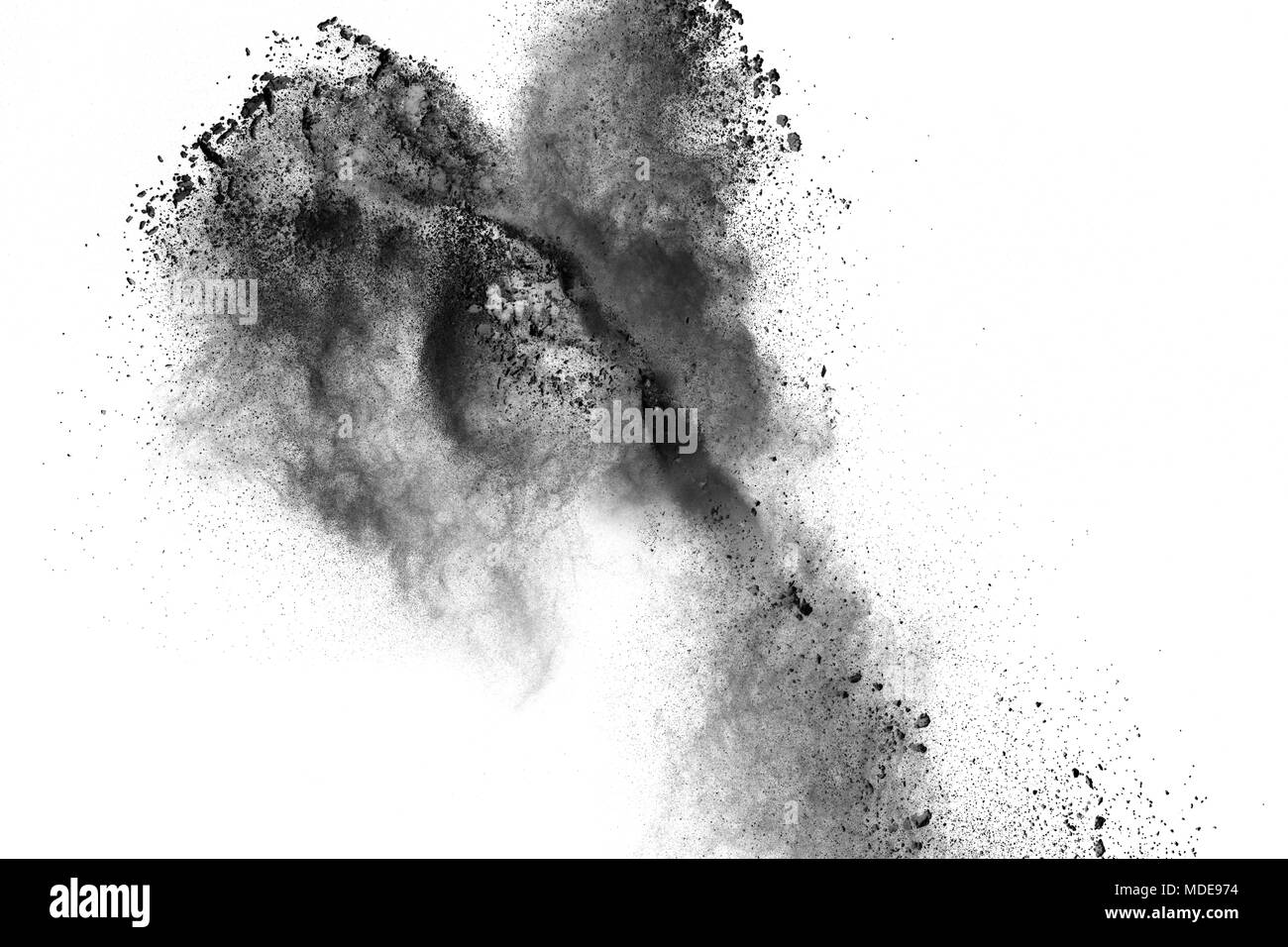 Black powder explosion against white background.The particles of ...