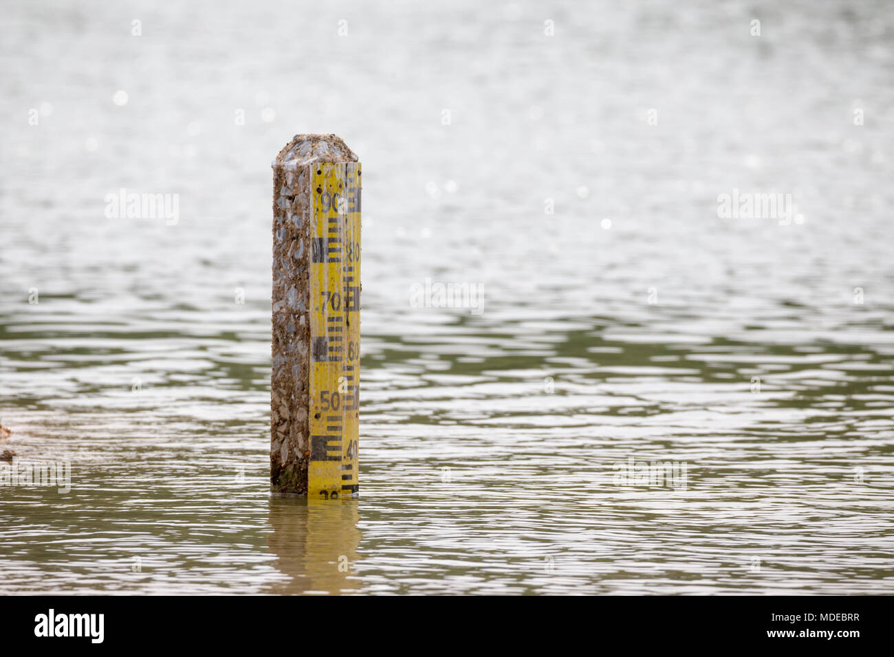Pole for water level in the dam Stock Photo - Alamy
