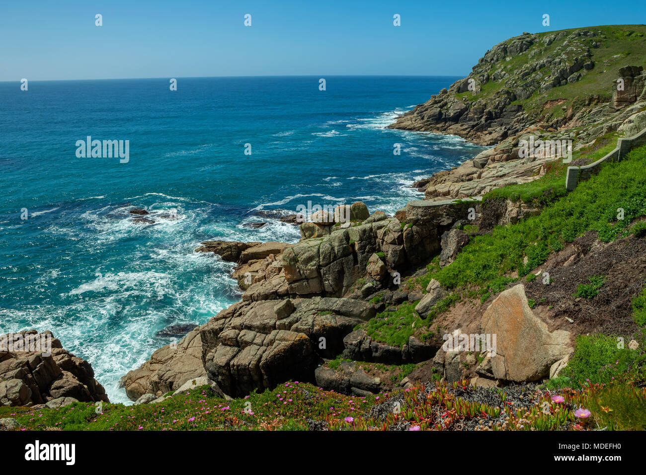 Rocky outcrop and wild flowers at Minack theatre, Cornwall Stock Photo ...