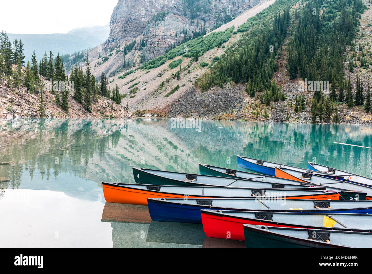 Multicolored canoes hi-res stock photography and images - Alamy