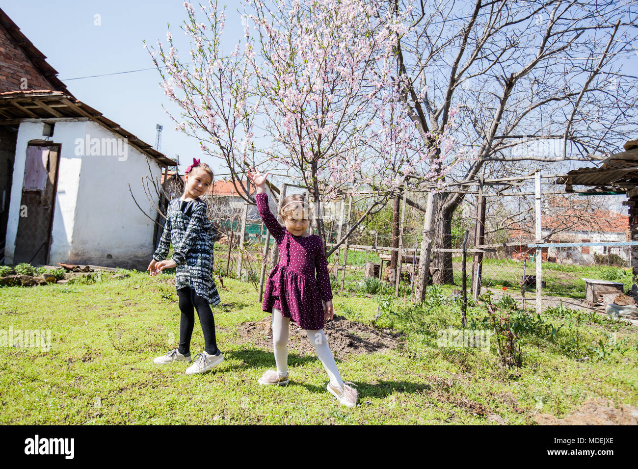 Happy little girls fun in nature spring season Stock Photo - Alamy