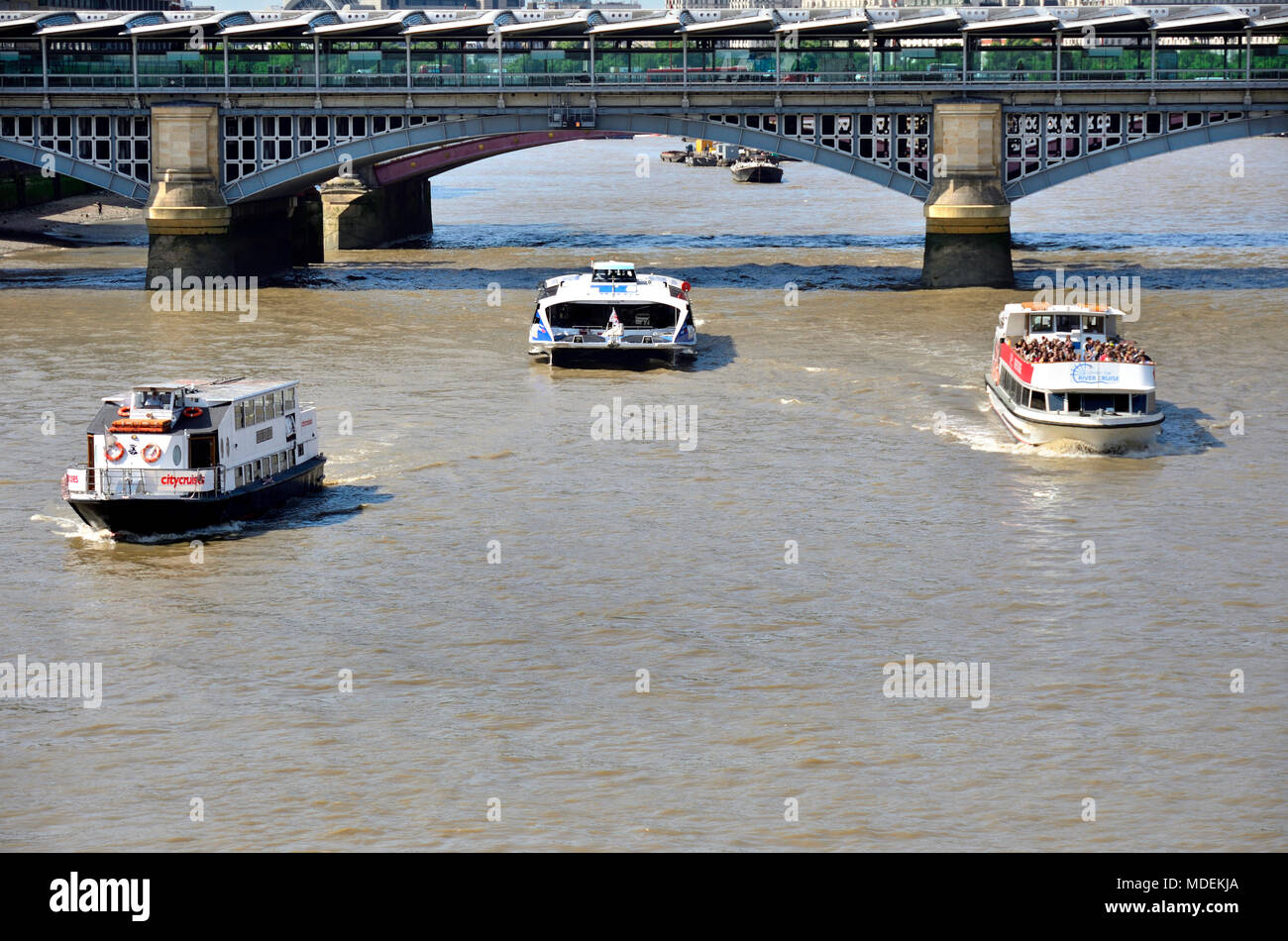 London, England, UK. Tourist cruise boats on the River Thames Stock ...